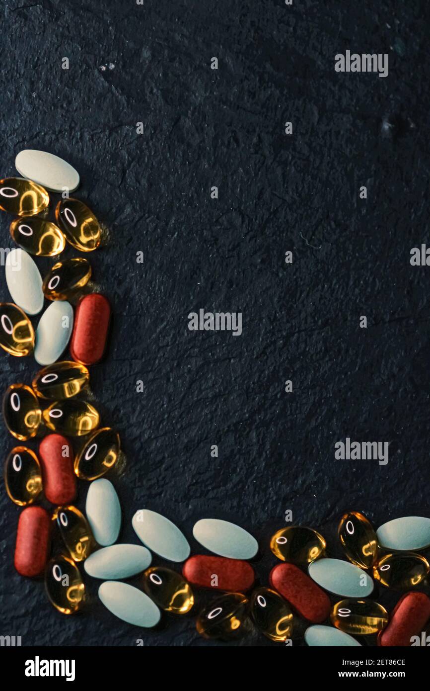 Frame made of medical pills as flatlay background, health and wellness ...