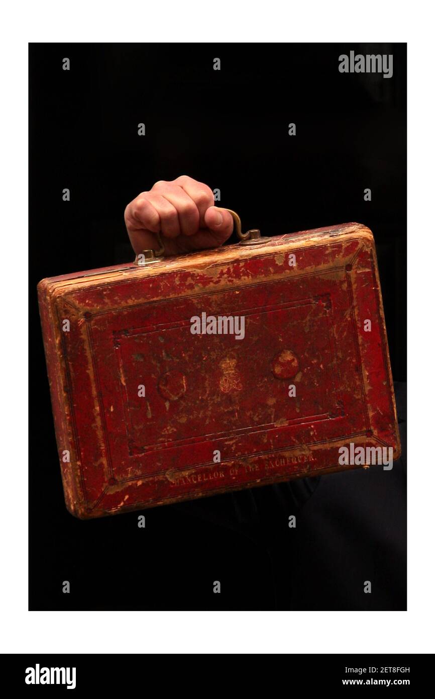 Chancellor of the Exchequer Alistair Darling holds up the red box ...