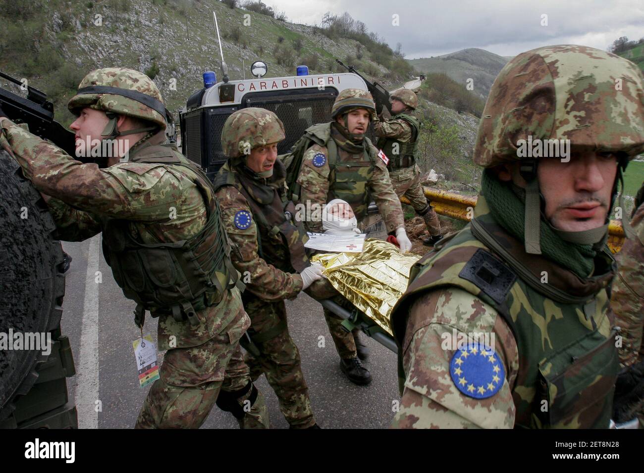 Italian member of the European Union peacekeeping force (EUFOR) secures ...