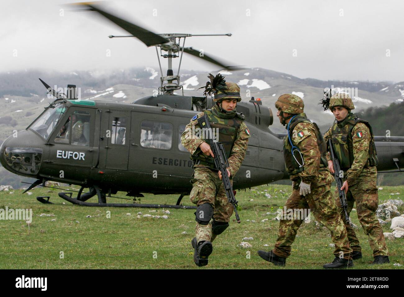 Italian member of the European Union peacekeeping force (EUFOR) secures ...