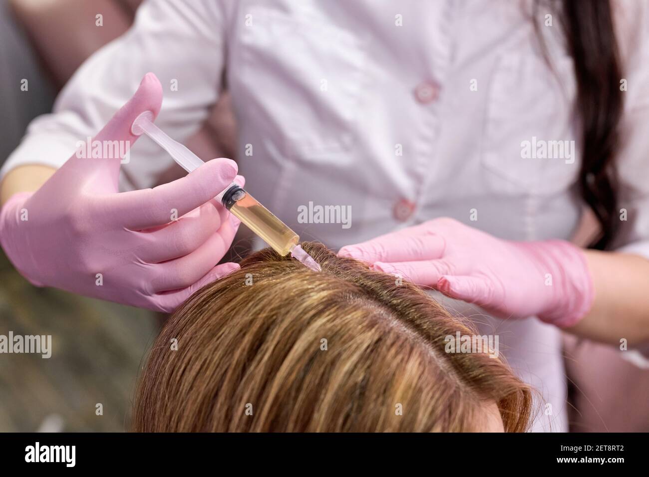 cropped female person at trichologist office get injections in head ...