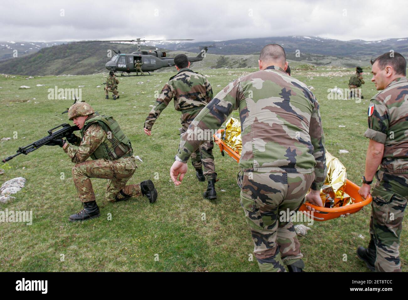 Italian member of the European Union peacekeeping force (EUFOR) secures ...