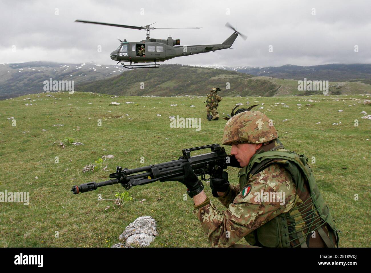 Italian member of the European Union peacekeeping force (EUFOR) secures ...