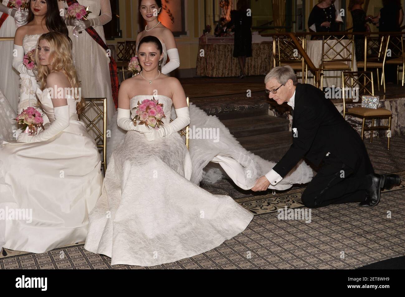 Graysen Leslie Airth of California has her dress adjusted before the ...