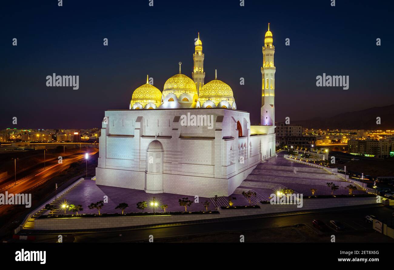 Nighttime view of Muhammad al-Amin mosque in Muscat, Oman Stock Photo ...