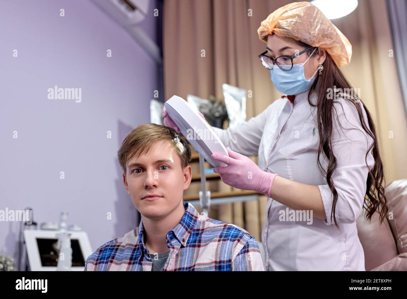 dermatological examination of the scalp and hair follicles of young ...