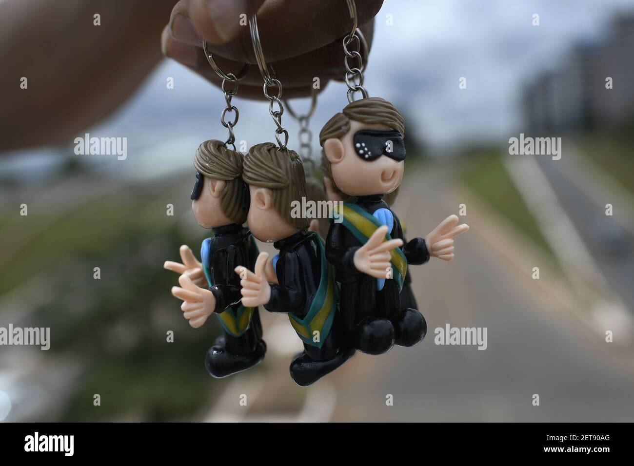 Keychain made in the likeness of President Jair Bolsonaro are sold by ...