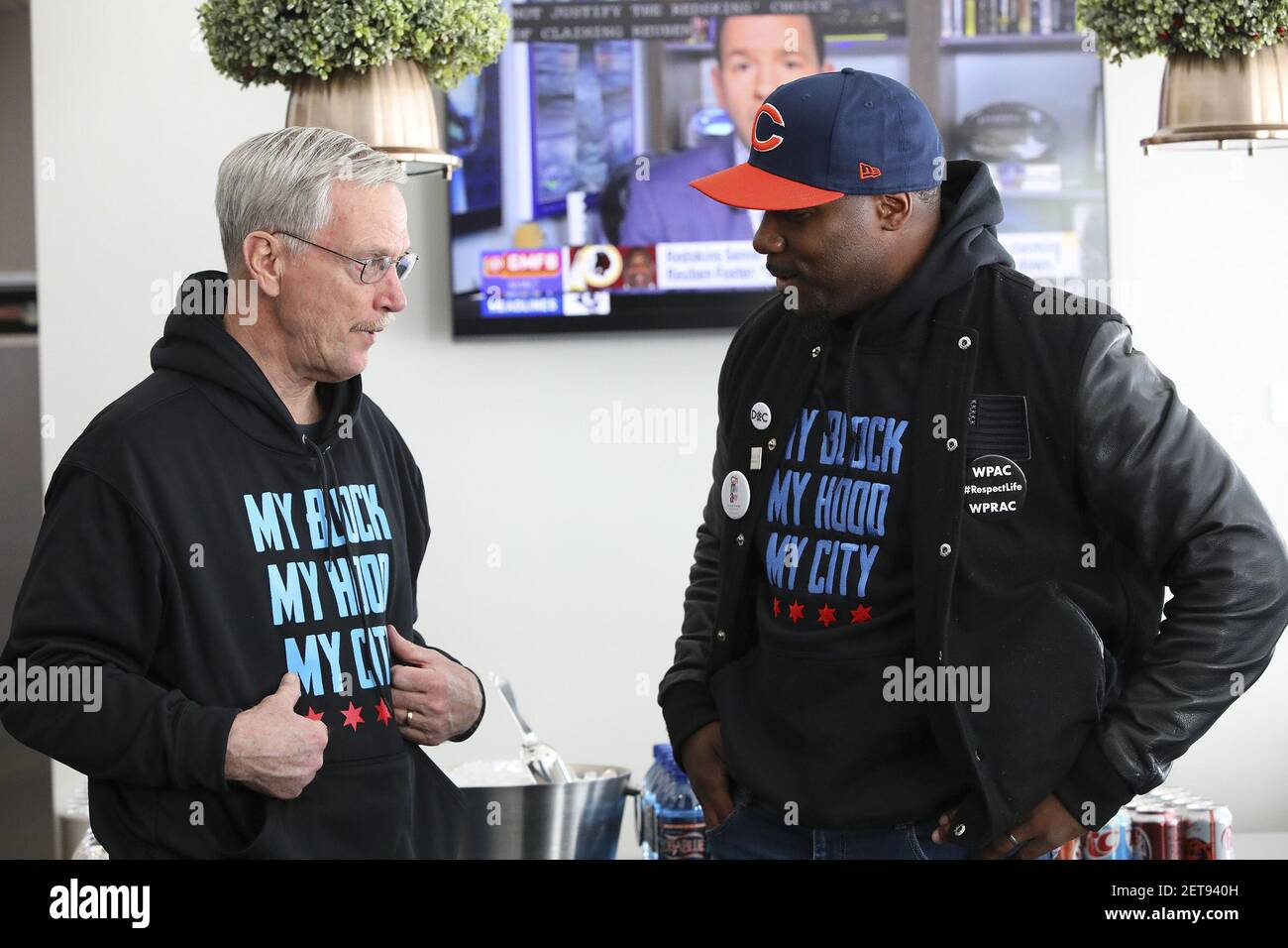 Chicago Bears owner George McCaskey, left, speaks with Jahmal Cole ...