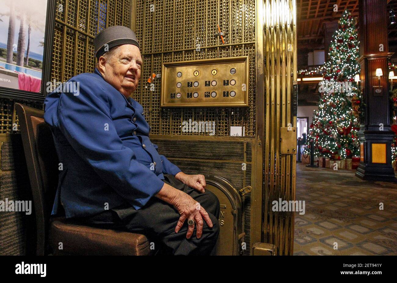 Elevator operator Andrew Lounsbury, 66, stands ready to take people on a ride in the elevator at ...