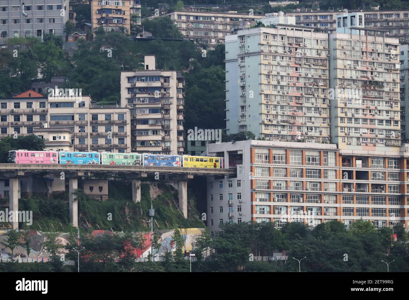 --FILE--A monorail train drives out from a building at the Liziba ...