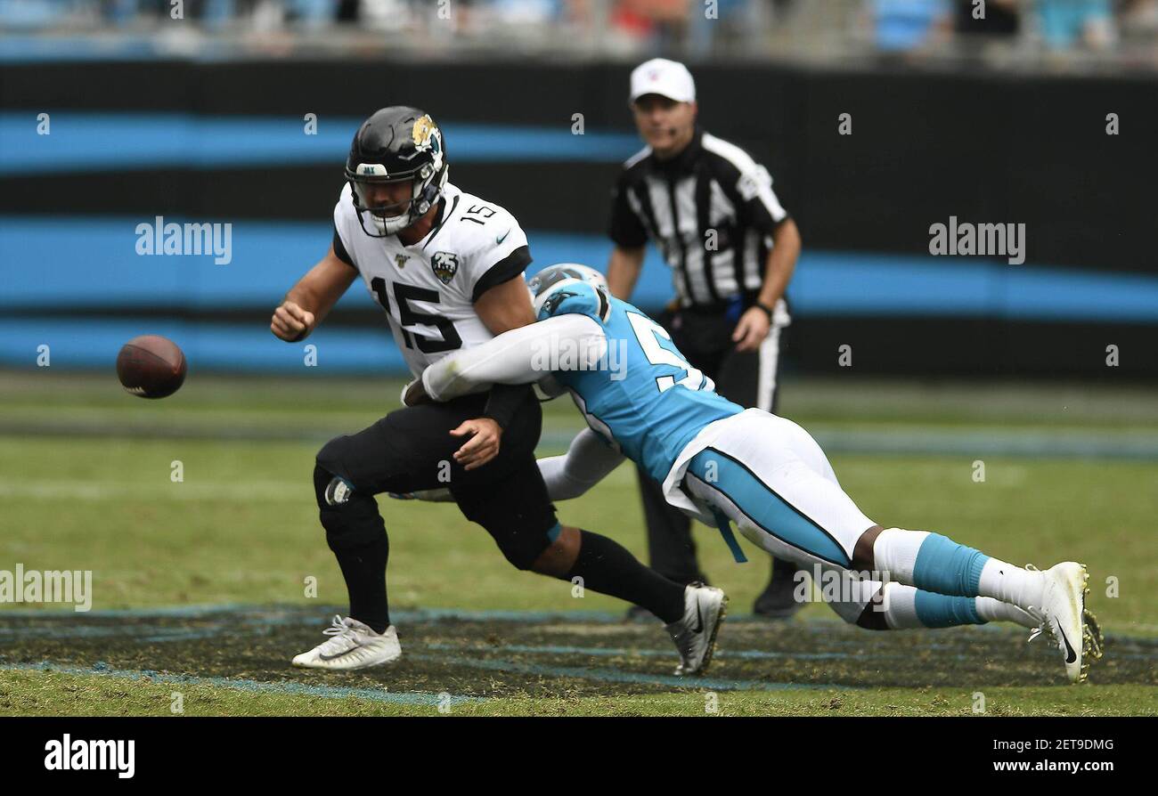 Carolina Panthers linebacker Brian Burns (53) strip-sacks Jacksonville ...