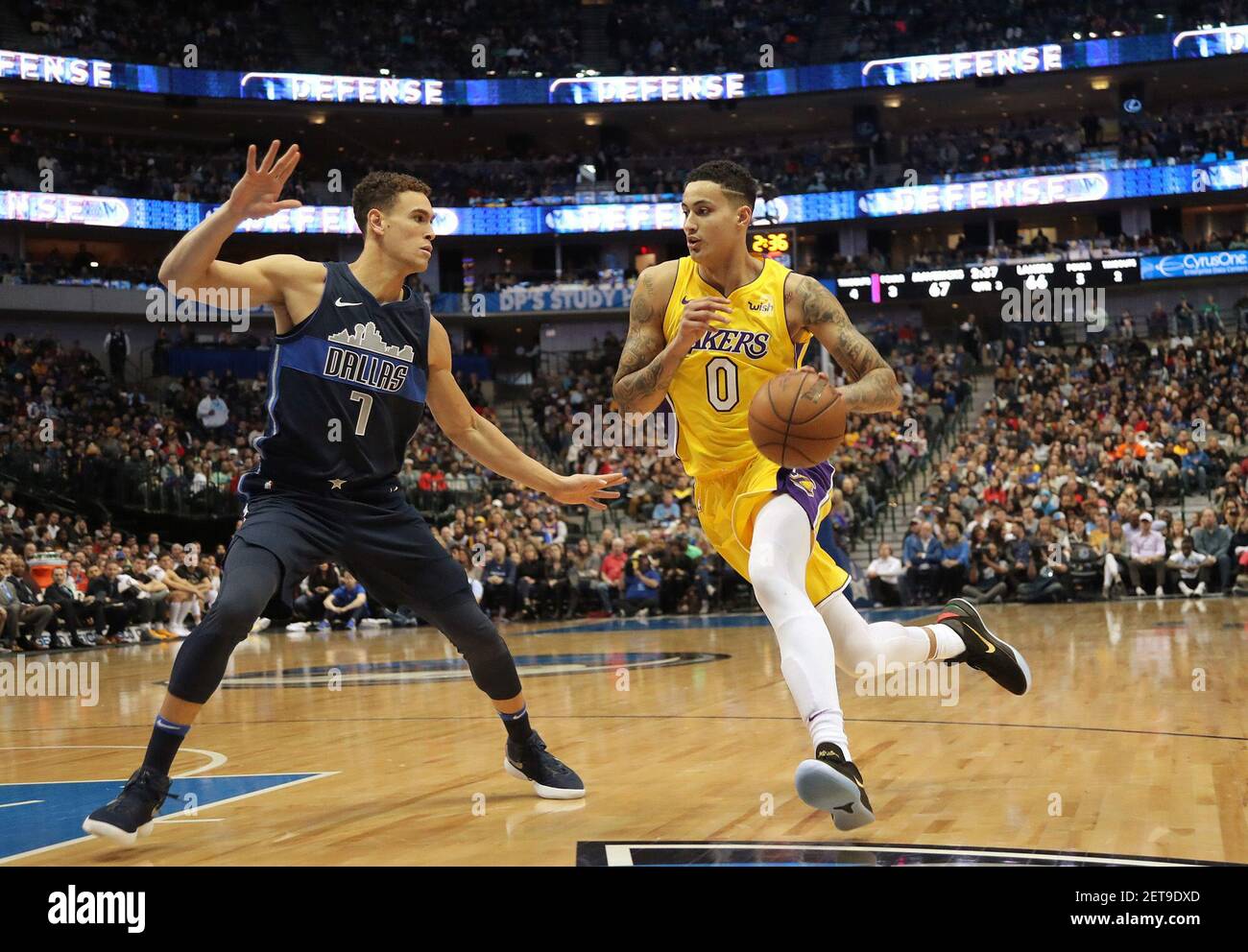 The Los Angeles Lakers' Kyle Kuzma (0) drives against the Dallas ...