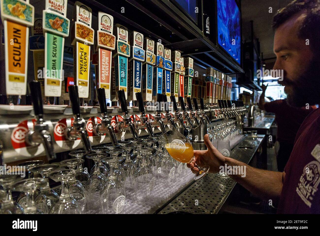 Bartender Justin Wilkinson pours a beer Tuesday, May 15, 2018 on the ...