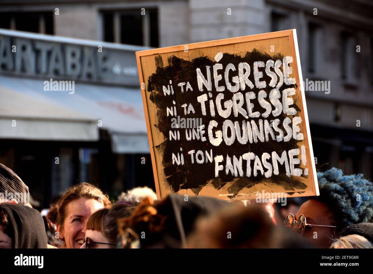 A protester holds a placard during the demonstration. Hundreds of ...