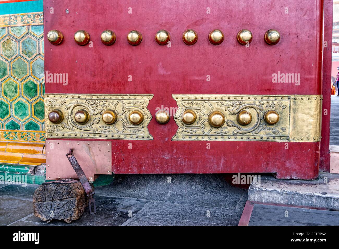 Beijing, China. 2nd June, 2017. Golden nails on giant wooden red door ...