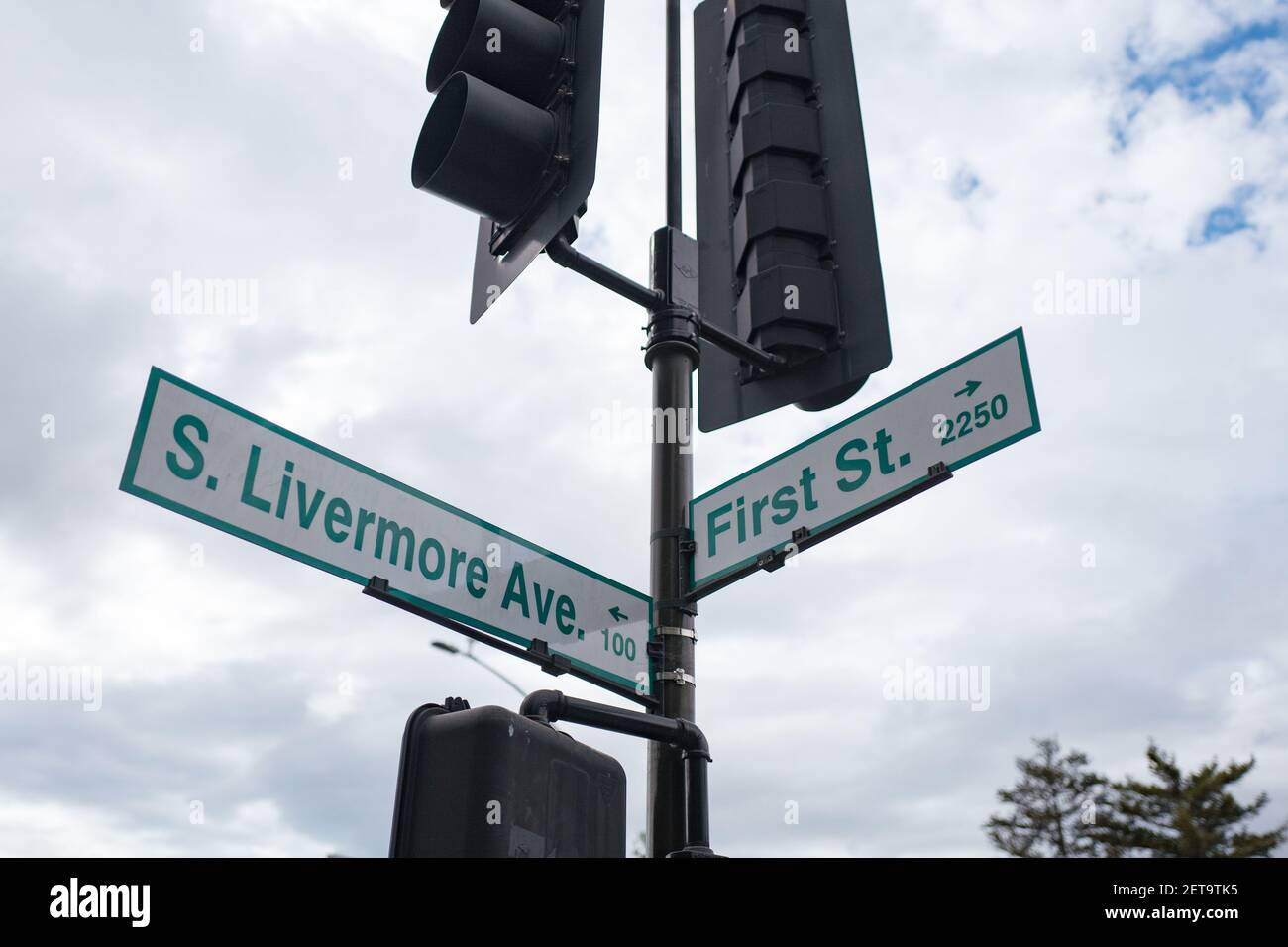 Road sign showing the intersection of Livermore Avenue and First Street ...
