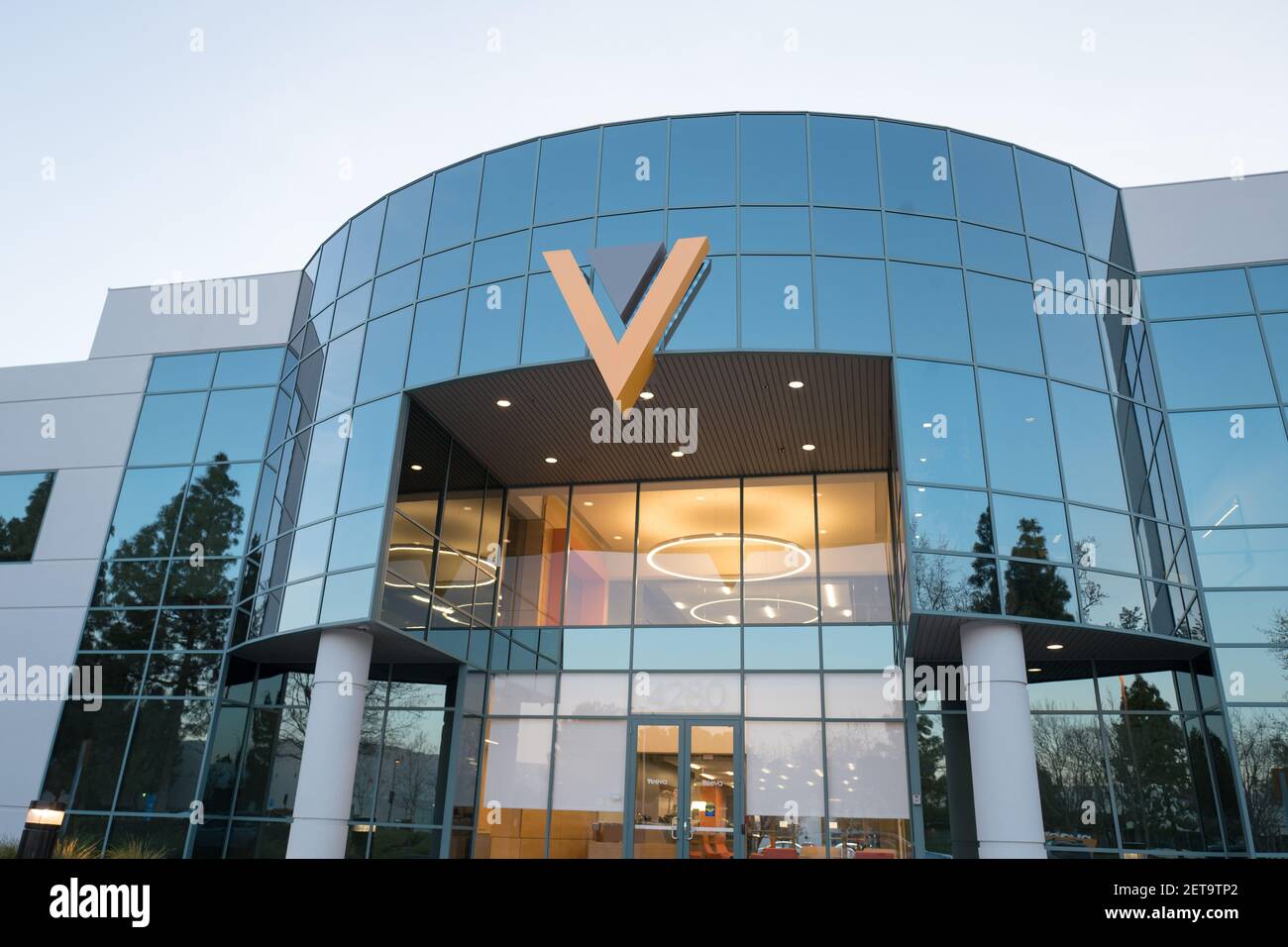 Facade with sign and logo at headquarters of life sciences company ...