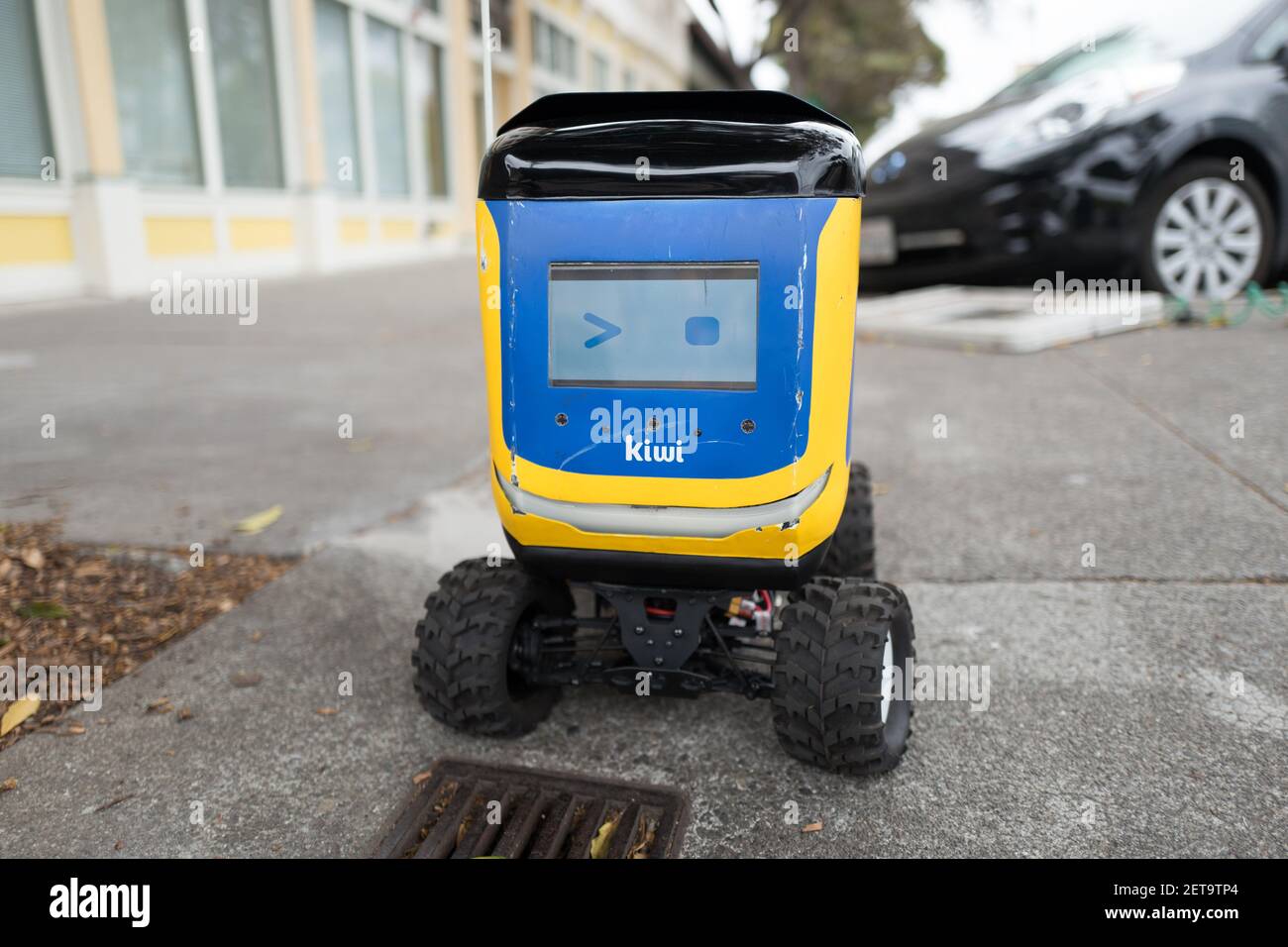 Front view with digital face of Kiwi self driving autonomous package ...
