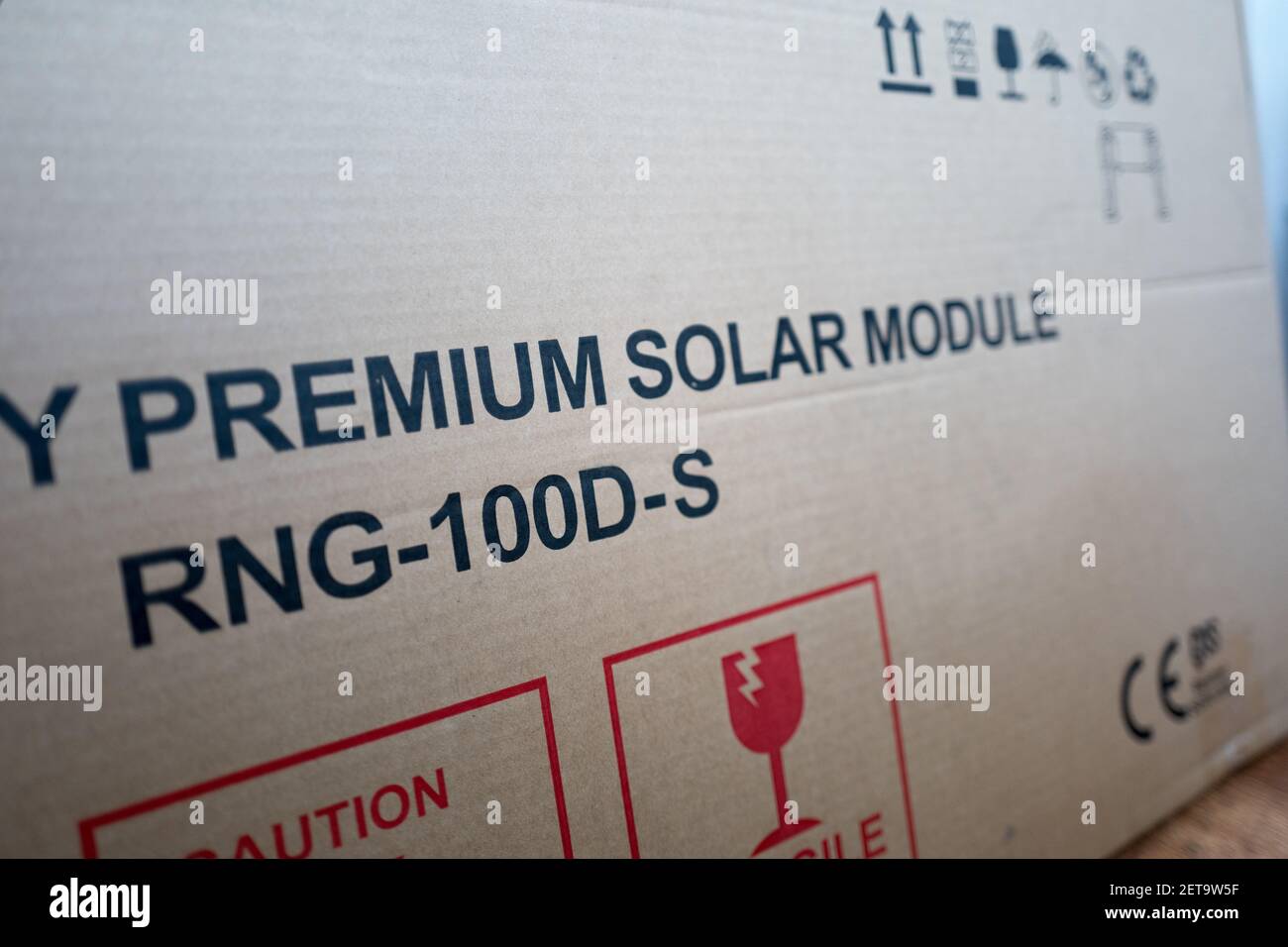 Side view of large cardboard shipping box with label reading Premium ...