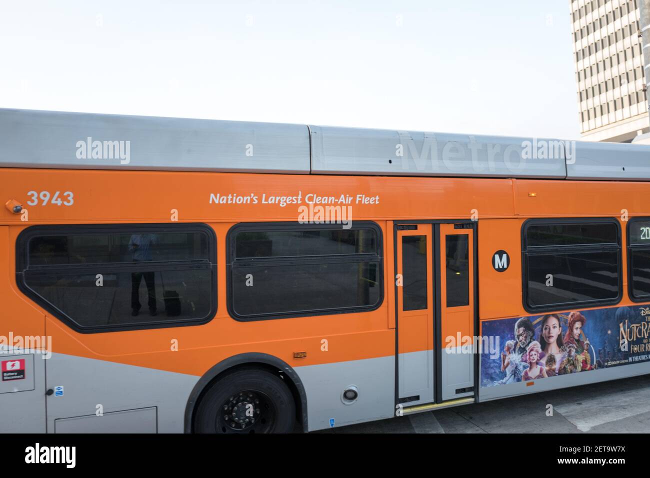 Side view of public transit bus on Wilshire Blvd in downtown Los ...
