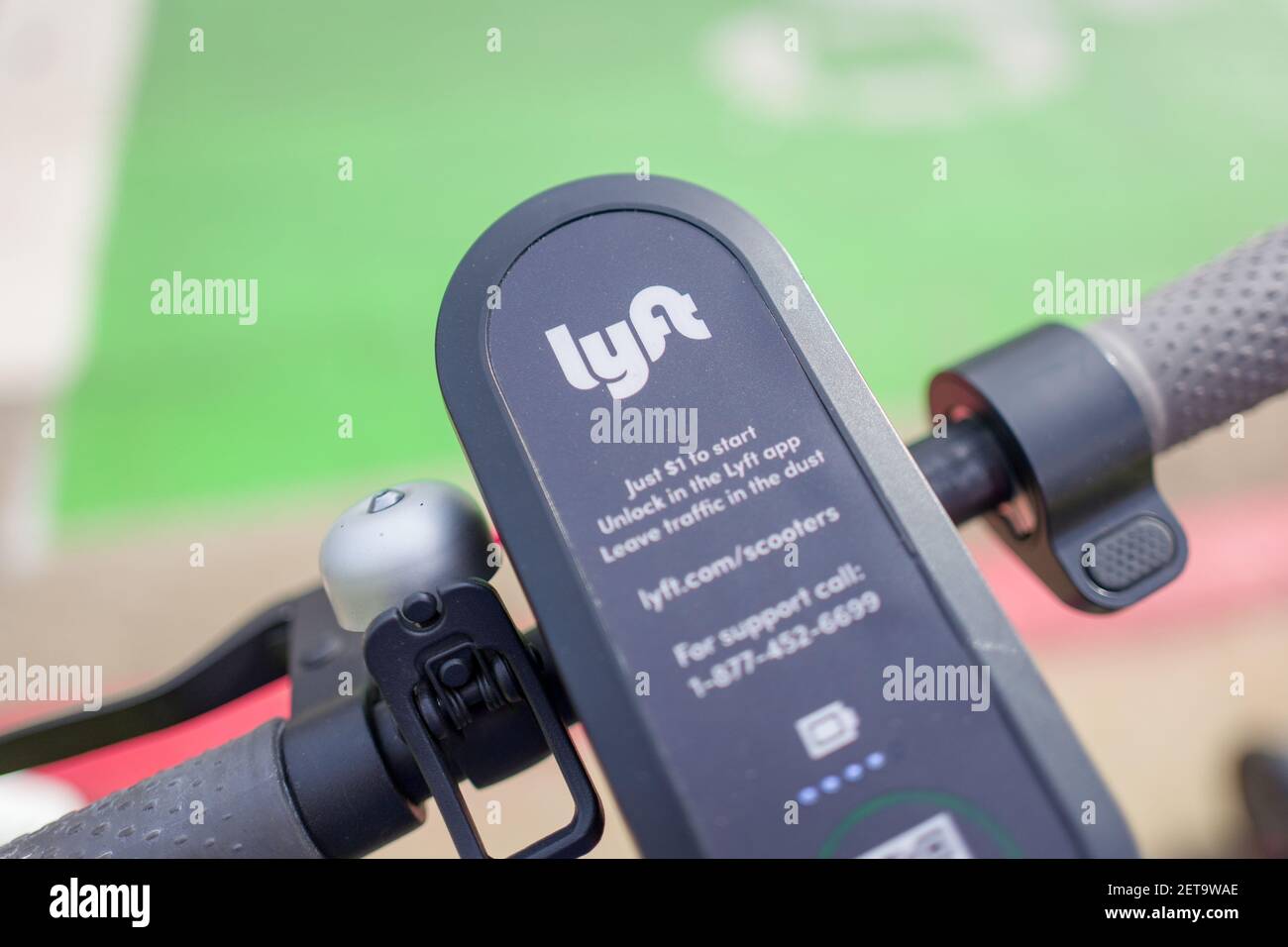 Close-up of logo for ridesharing company Lyft on rentable dockless ...