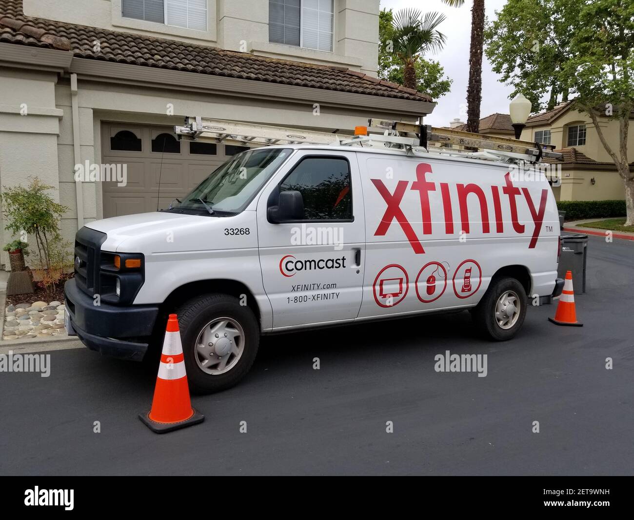 Comcast Xfinity cable television installation truck parked on a street ...