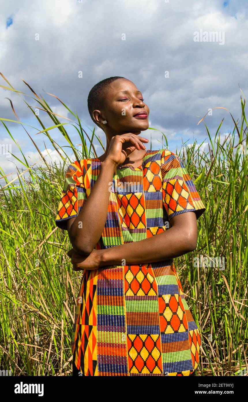 Fibi a local designer and model from Kibera Slums takes a poses in her ...