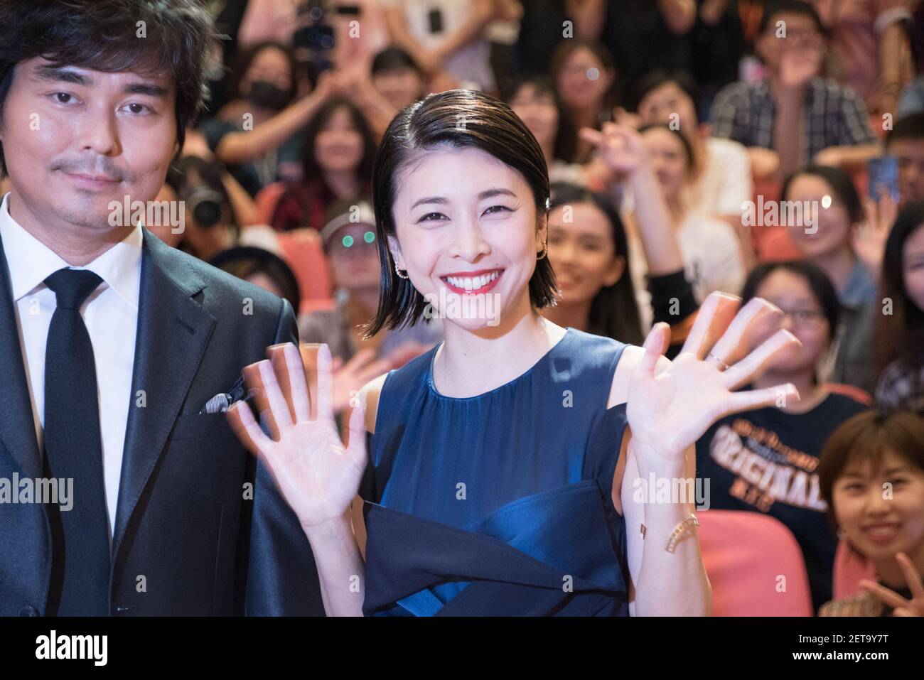 --File--Japanese actress Yuko Takeuchi, right, and actor Yukiyoshi ...