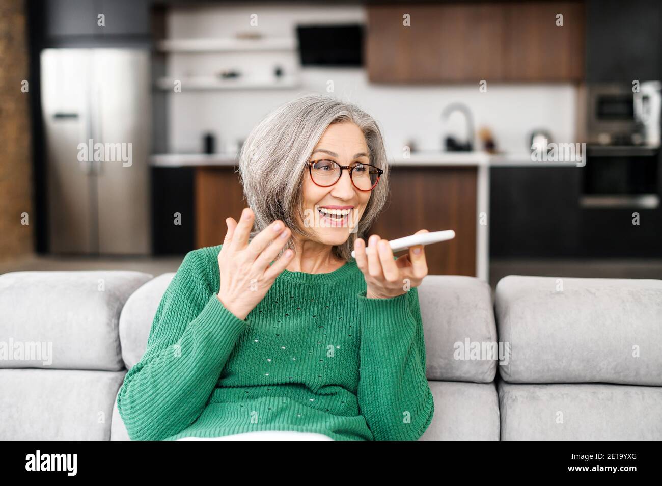 Senior sending voice message hi-res stock photography and images - Alamy