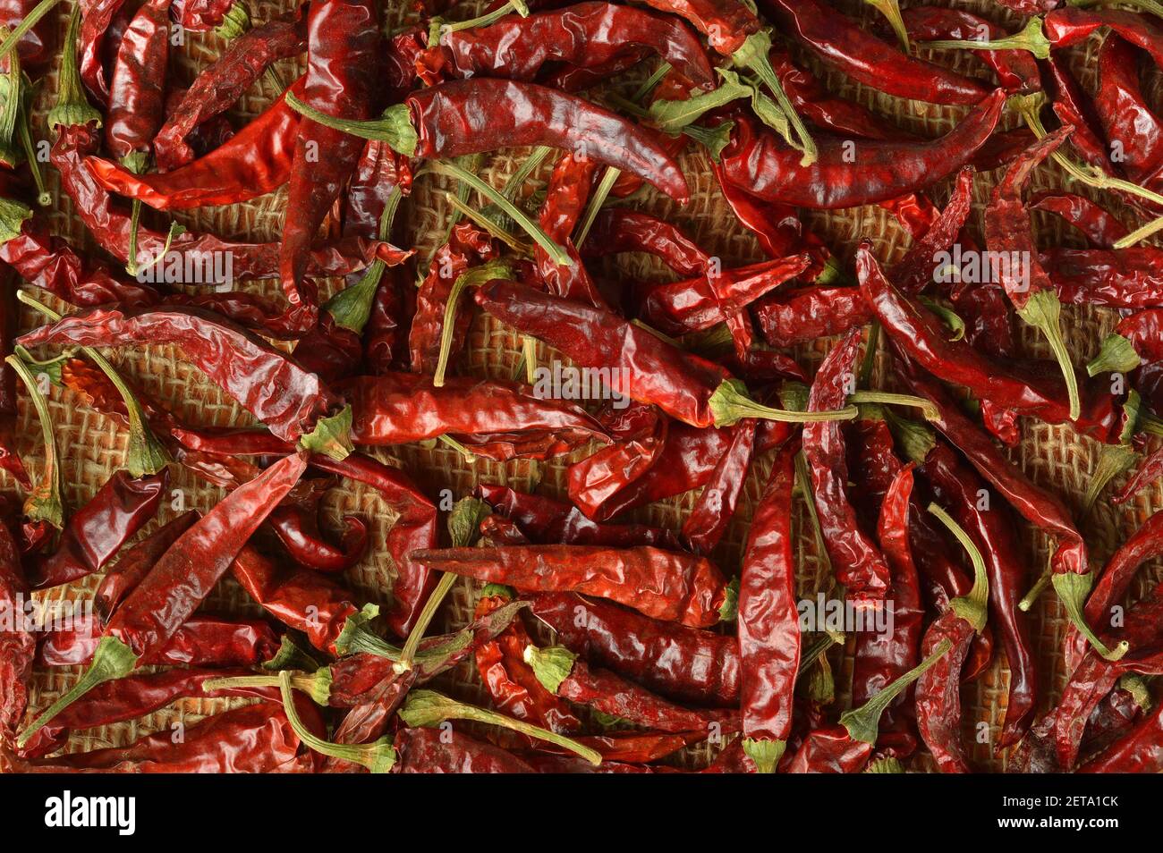 Texture of spicy red peppers Stock Photo - Alamy