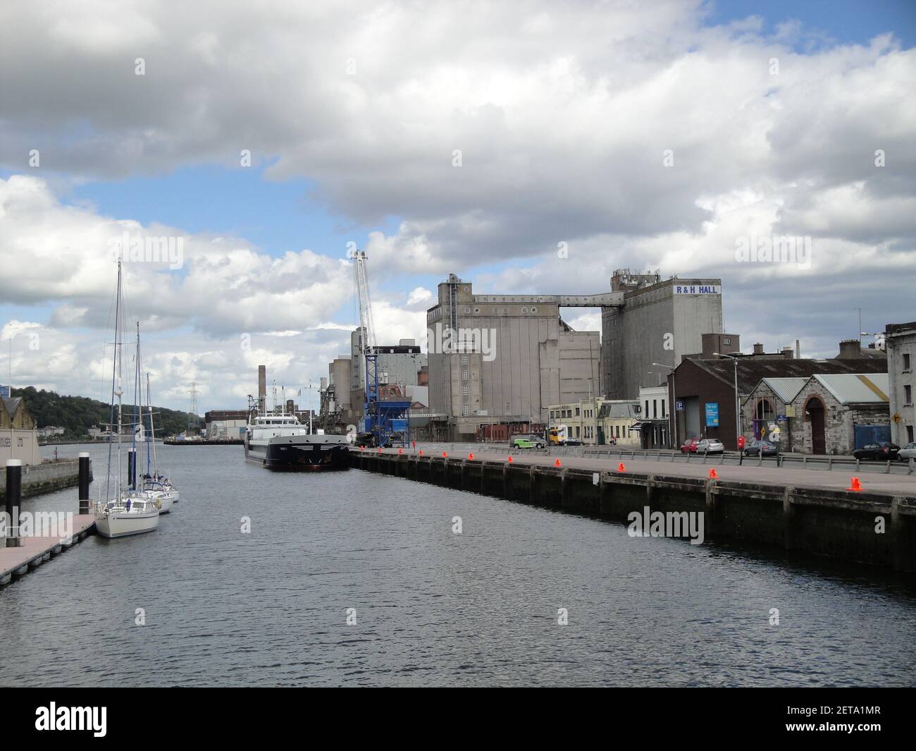 CORK, IRELAND - Aug 14, 2011: Industrial port of Cork, Ireland. Silos ...
