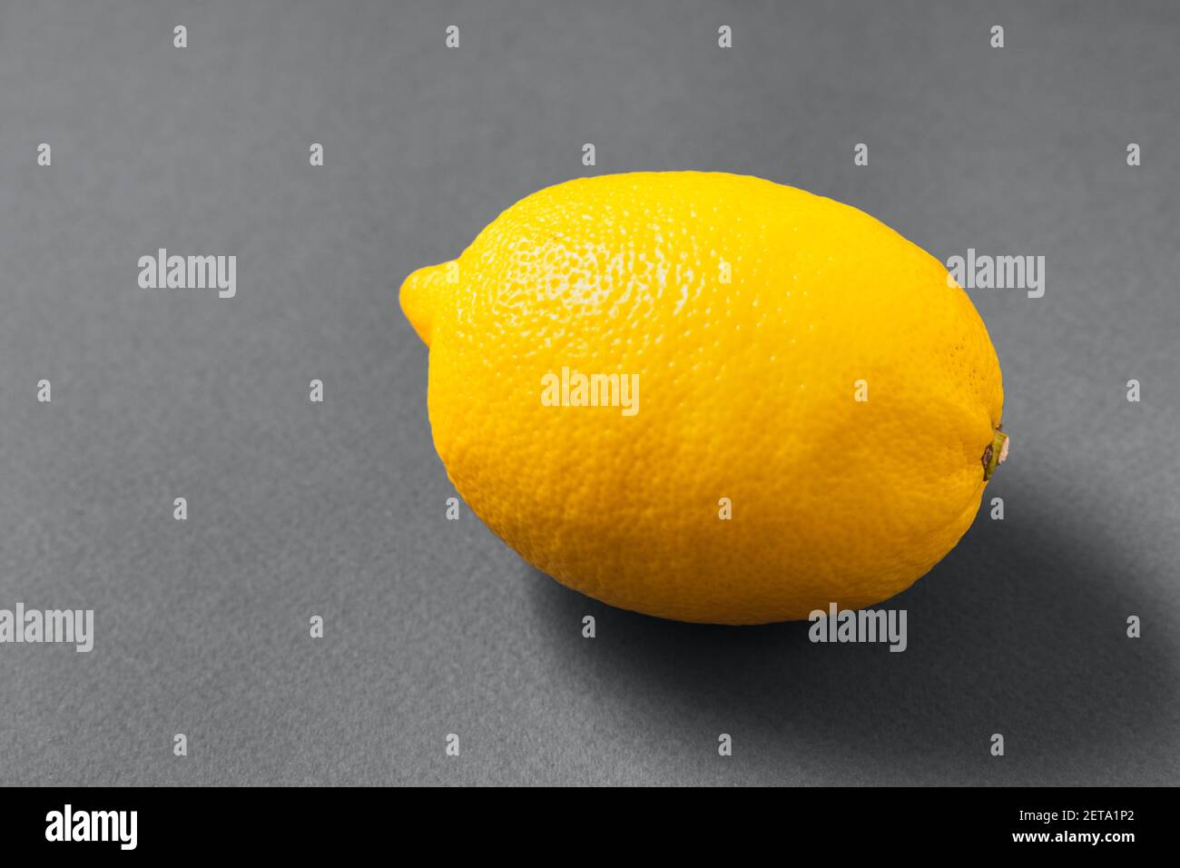 Raw lemon fruit on trendy ultimate gray background,flat lay Stock Photo ...