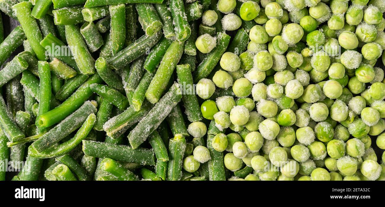 Frozen green string beans and peas on black background, flat lay Stock ...