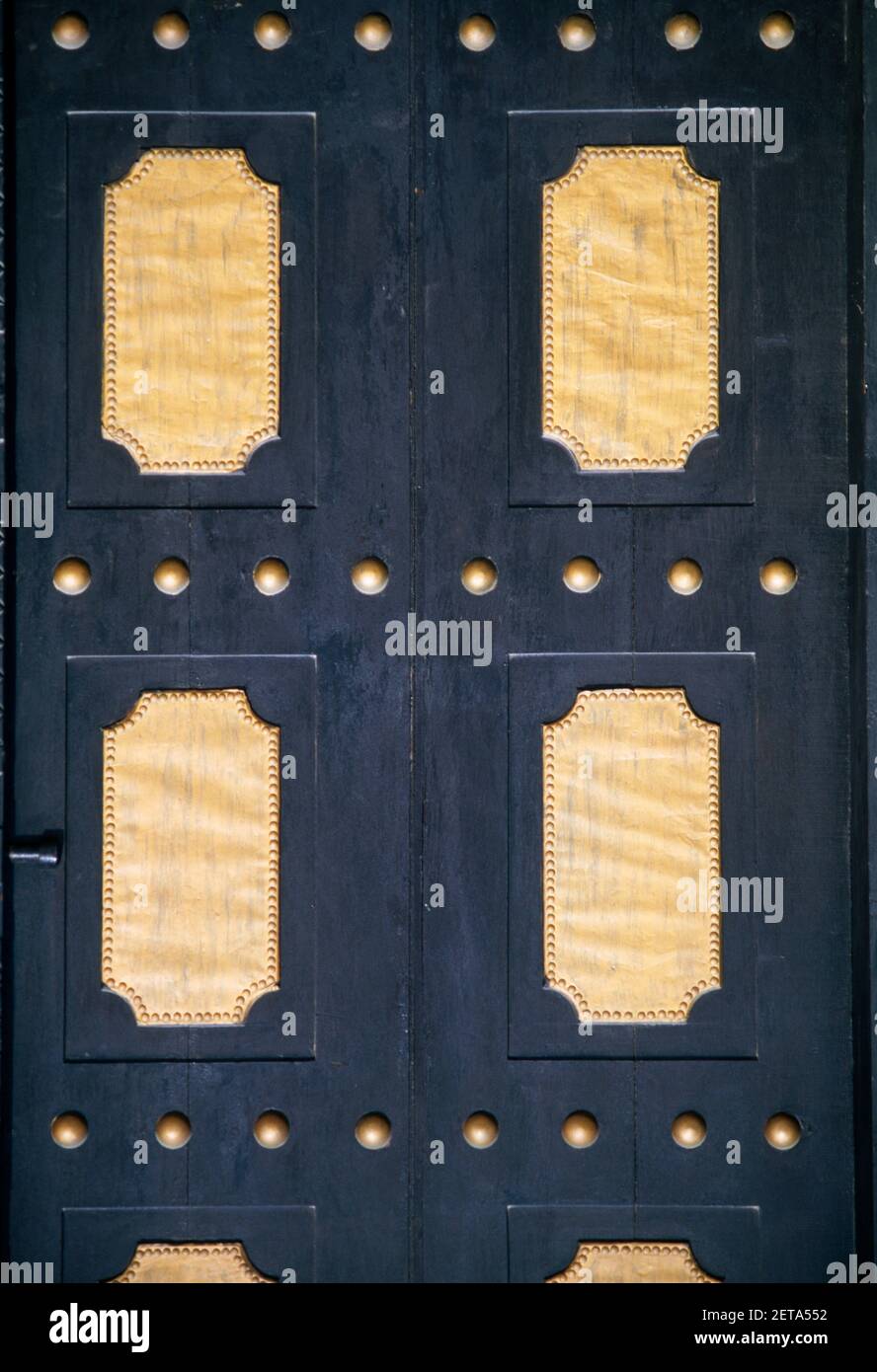 Dubai UAE Wooden Door with Gold Panels Stock Photo - Alamy