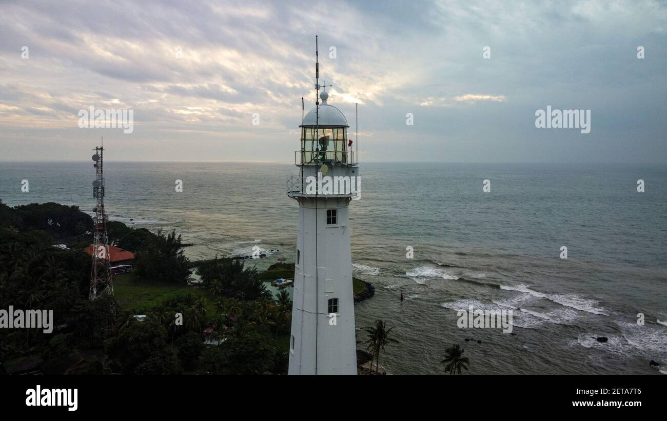 Aerial view of Lighthouse sea rock sunset landscape. Sunset lighthouse ...