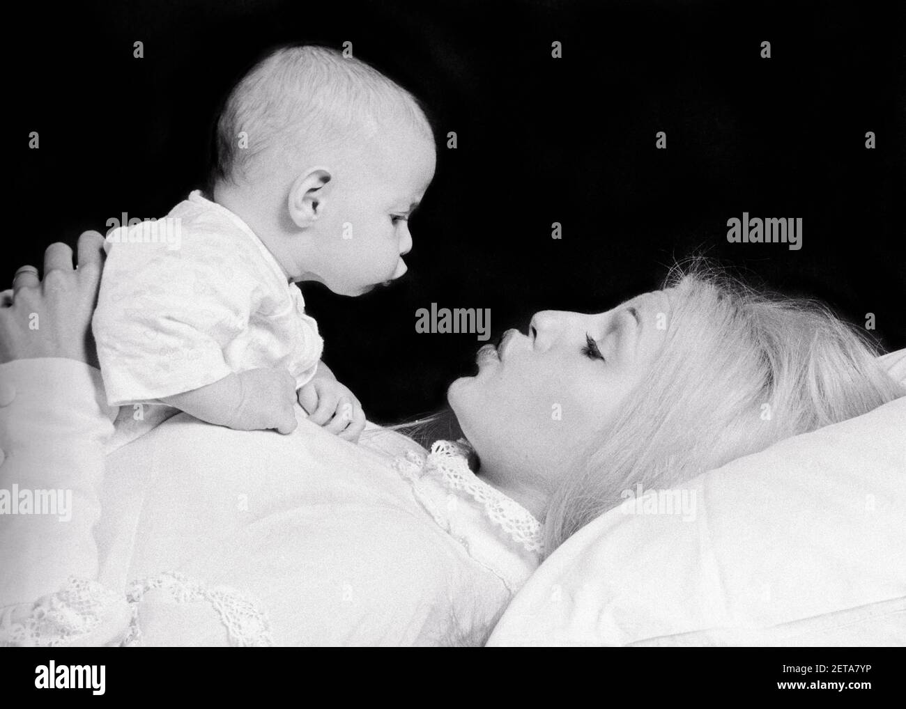 Imitating baby facial expressions hi-res stock photography and images ...