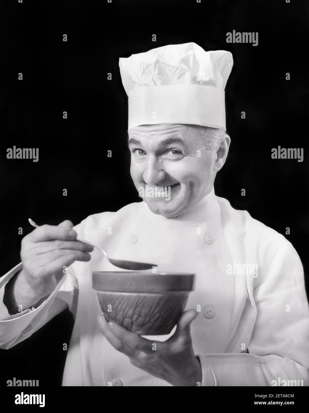 Adult chef with toque mixing bowl hi-res stock photography and images ...