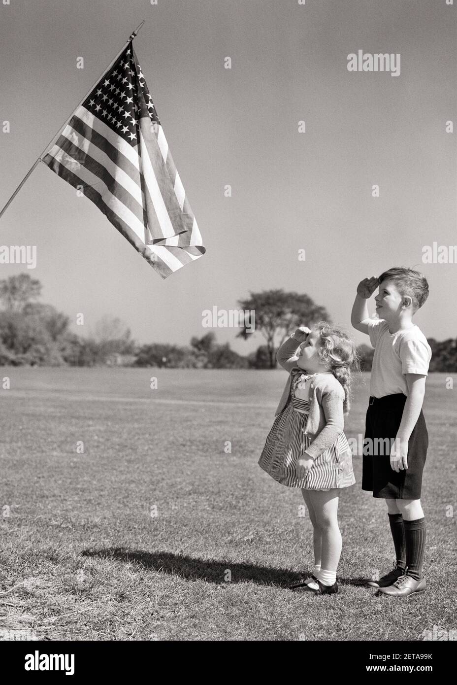 Children saluting flag hi-res stock photography and images - Alamy