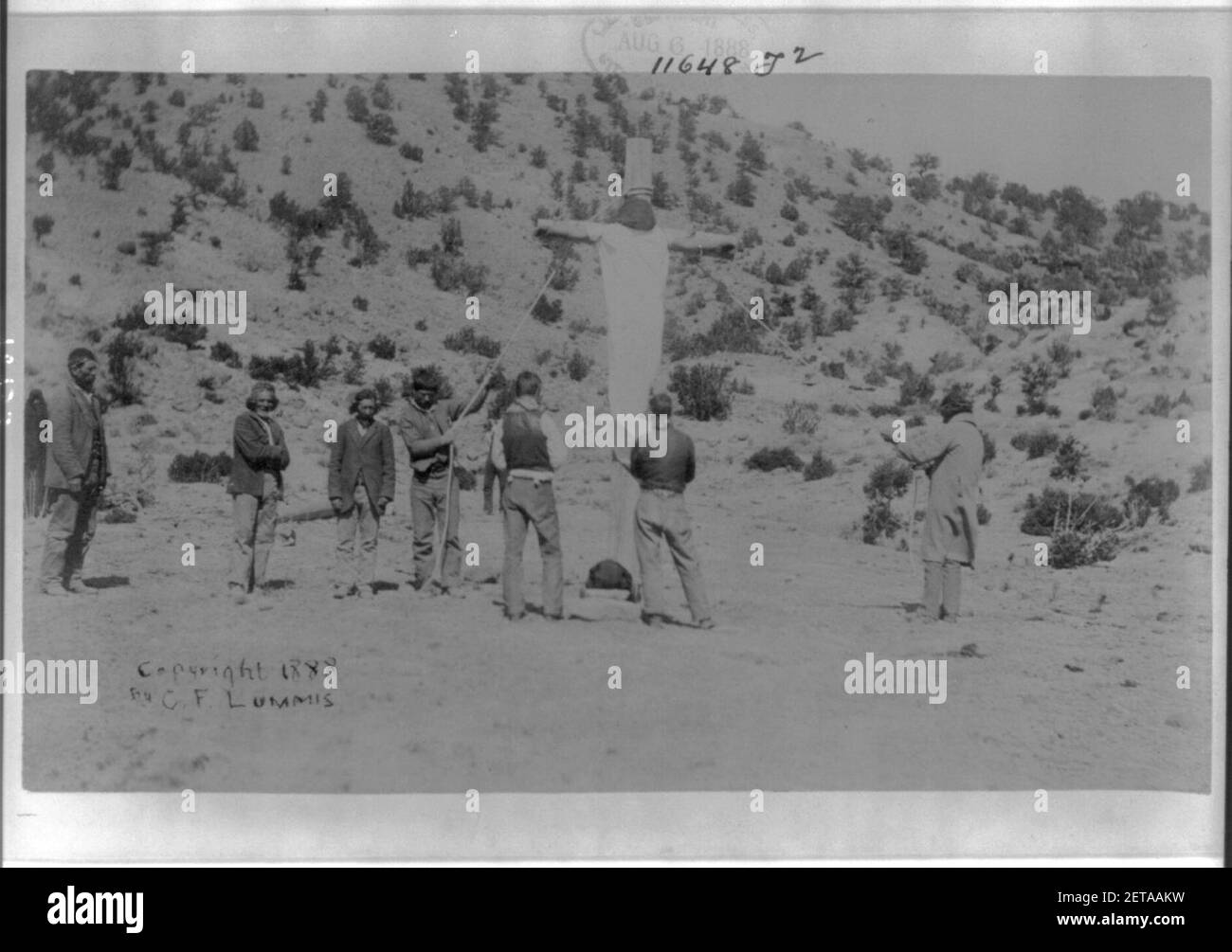 Penitents ''crucifying'' one of their own- person on huge wooden cross ...