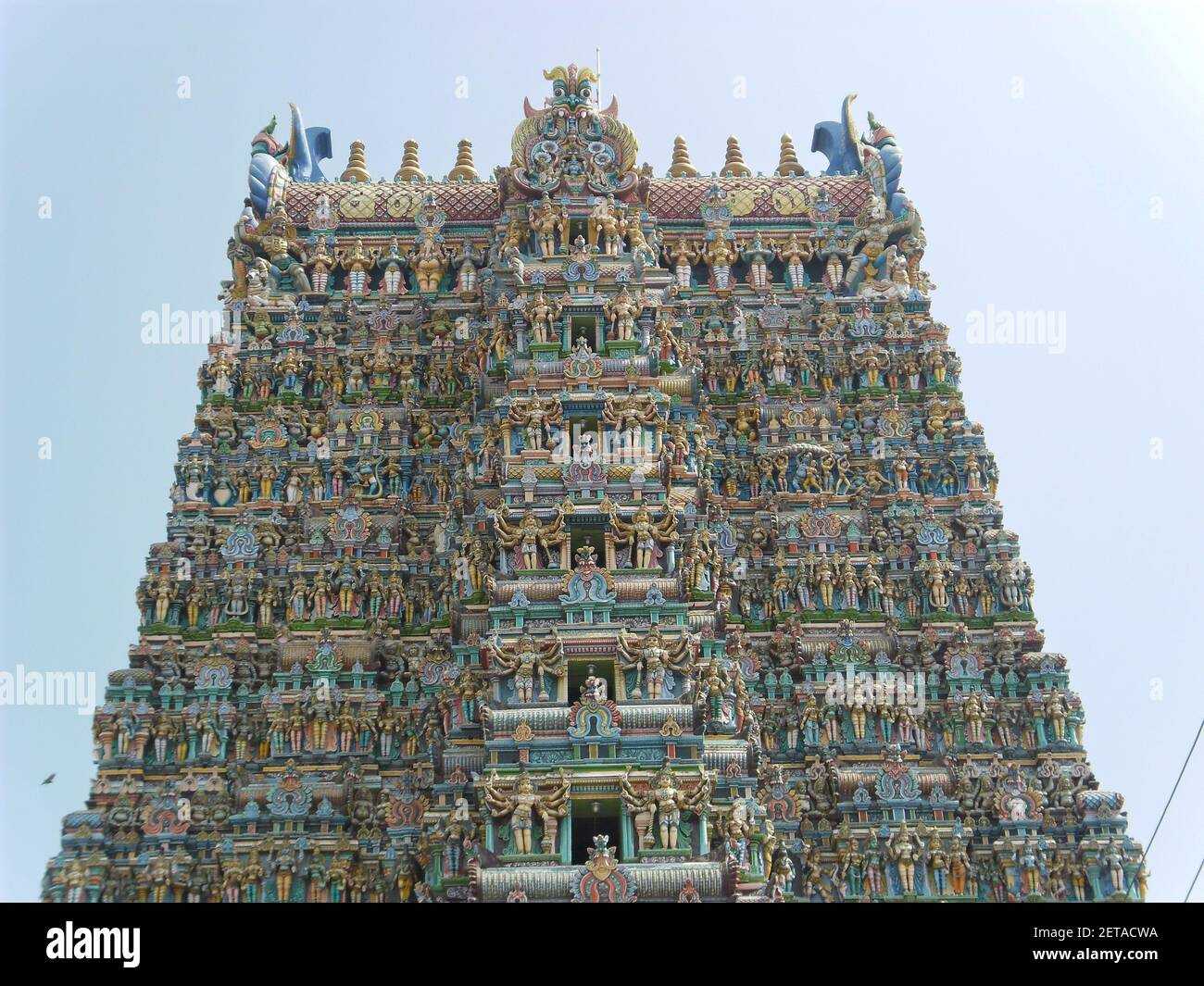 A colorful Hindu temple of Meenakshi in the city of Madurai in the ...