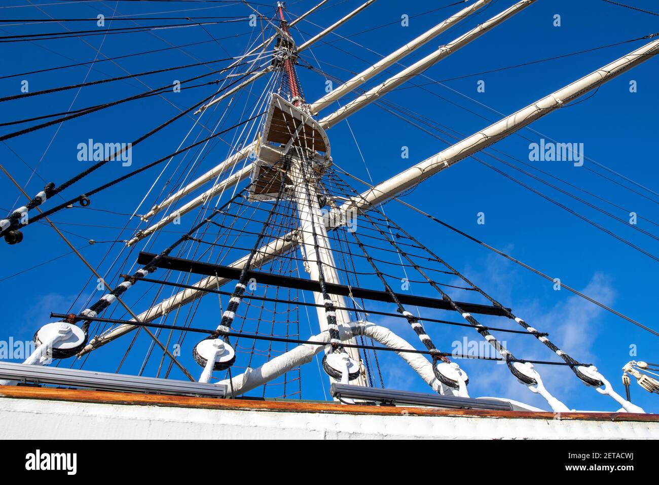 Rigging and mast of a large sailing ship. Ropes and pulleys for ...