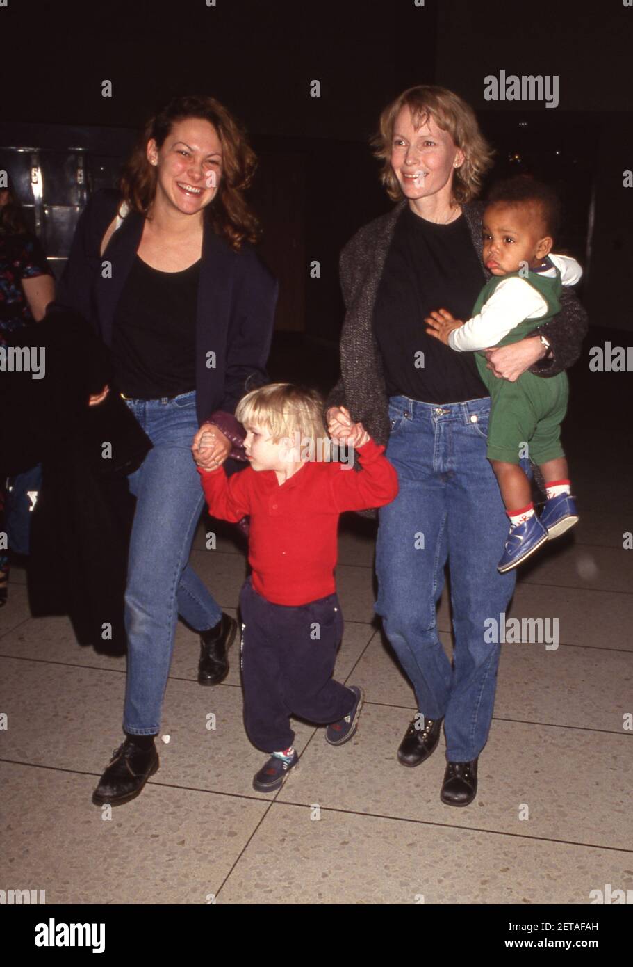 LOS ANGELES, CA - FEBRUARY 4: Mia Farrow with Ronan Farrow and Isaiah ...