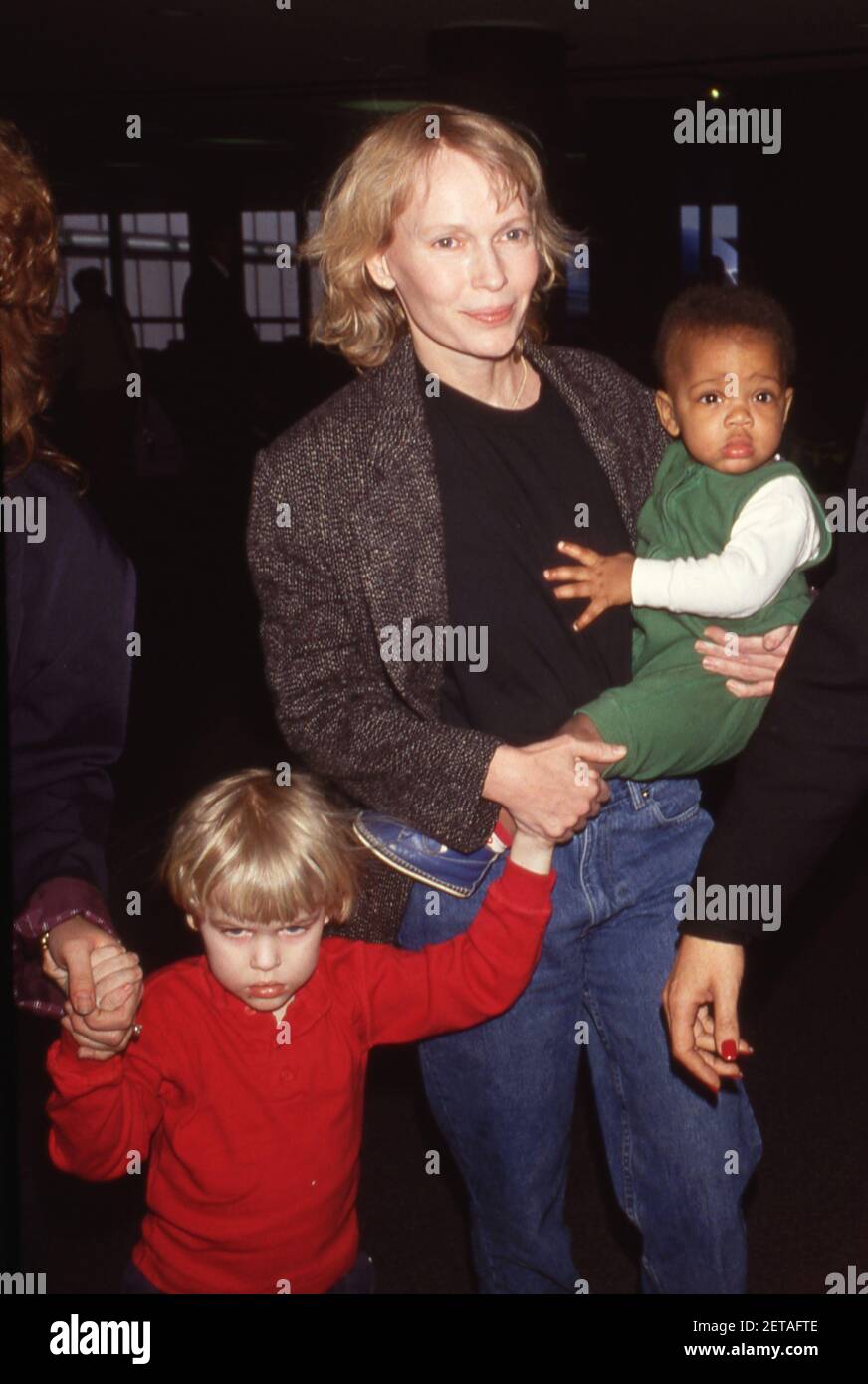LOS ANGELES, CA - FEBRUARY 4: Mia Farrow with Ronan Farrow and Isaiah ...