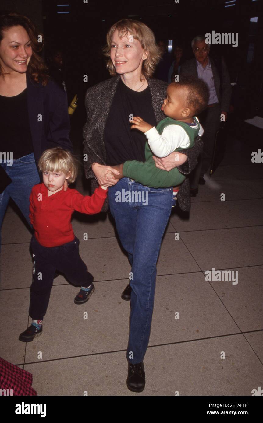 LOS ANGELES, CA - FEBRUARY 4: Mia Farrow with Ronan Farrow and Isaiah ...