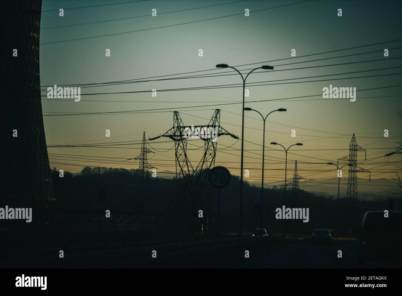 A beautiful view of street lights and transmission towers with power ...