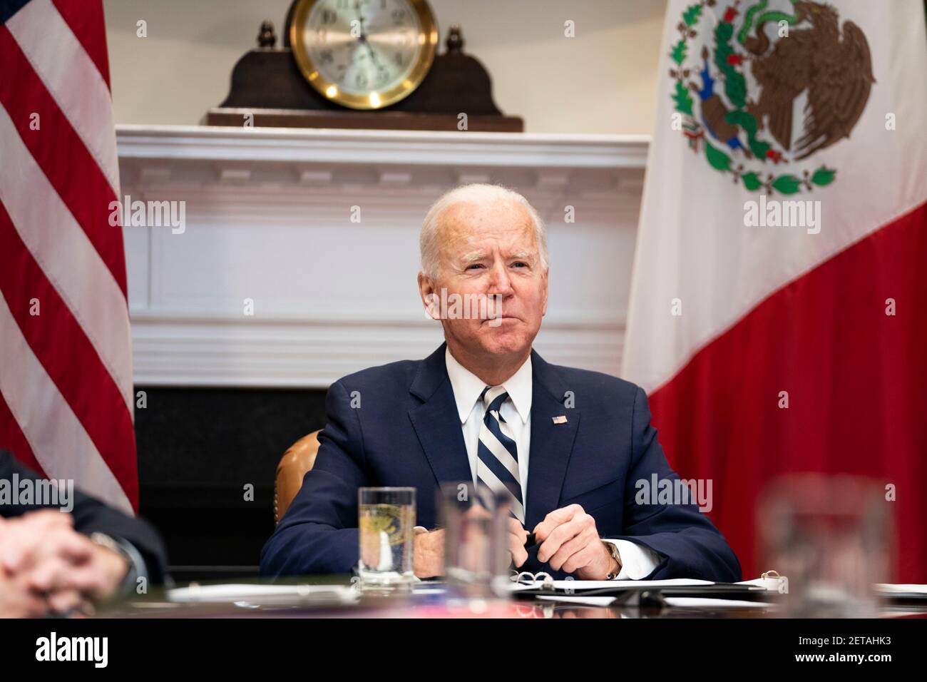 President Joe Biden participates in a virtual bilateral meeting with ...