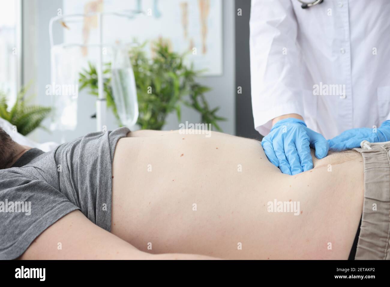 Stomach Pain Doctor High Resolution Stock Photography and Images - Alamy