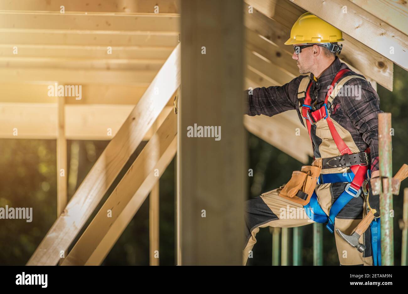 Caucasian Construction Contractor in His 40s Wearing Safety Harness and ...