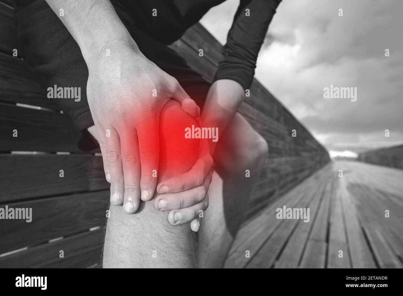 Man with knee pain, joint pain, arthritis or tendon problems. Runner ...