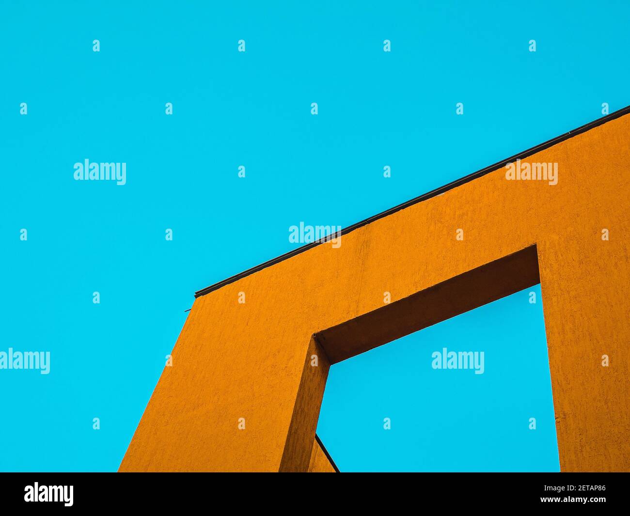 A low angle shot of modern architectural details on a blue sky ...